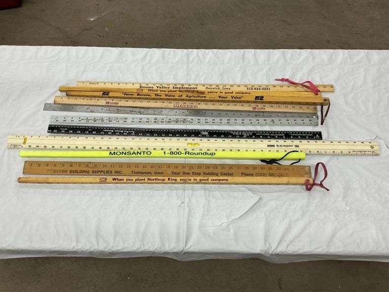 Measuring sticks - Legacy Auction Company