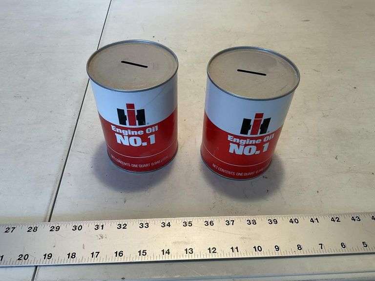 2- IH oil can banks - Legacy Auction Company