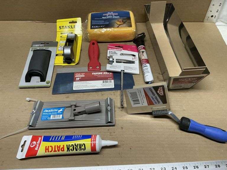 Mud pan, grout sponge, pocket rasp, taping knife, - Legacy Auction Company