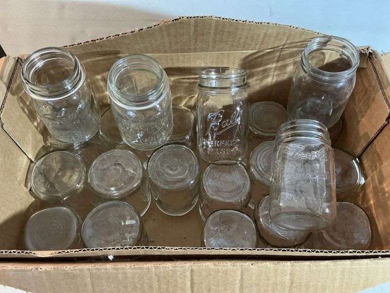 Clear pint jars - Legacy Auction Company