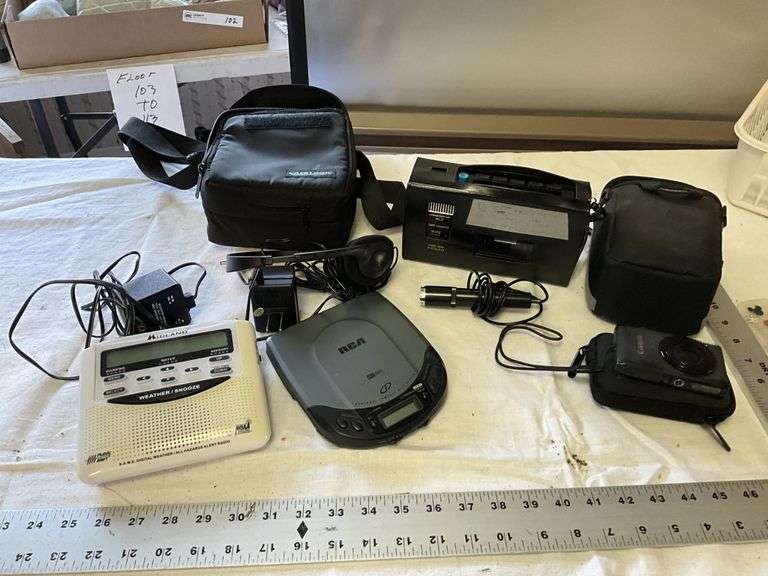 Weather radio, RCA CD player, cassette recorder, - Legacy Auction Company