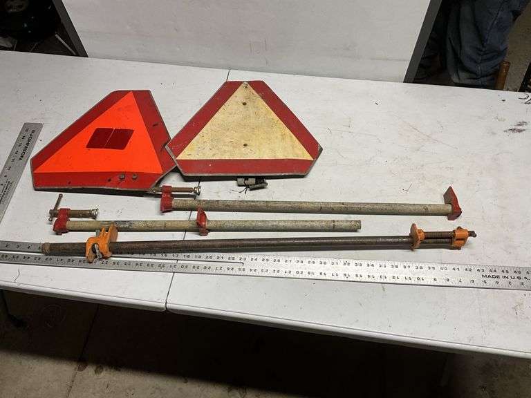 SMV Signs and pipe clamps - Legacy Auction Company