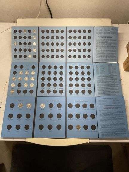 3- Canada 5 , 10 and 25 cent books with coins - Legacy Auction Company