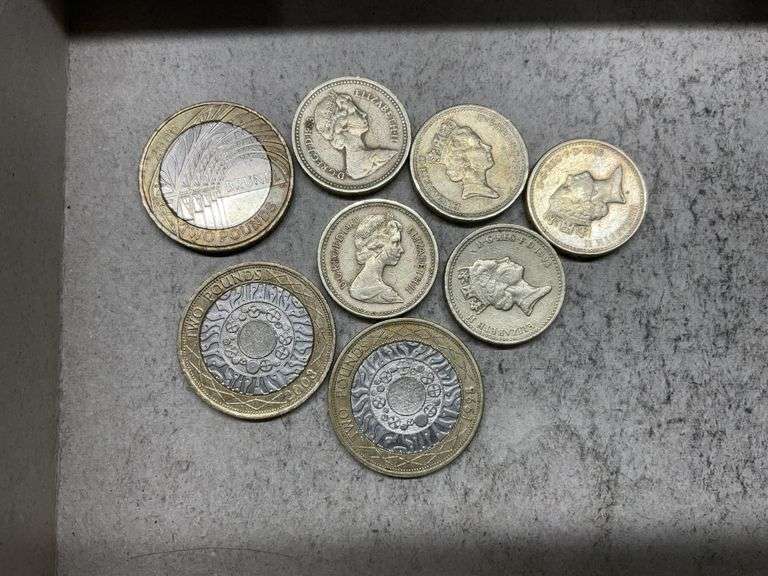 8- British pound coins - Legacy Auction Company