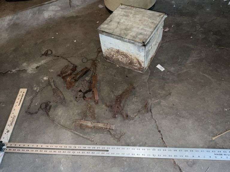 Vintage traps and rusty metal box - Legacy Auction Company