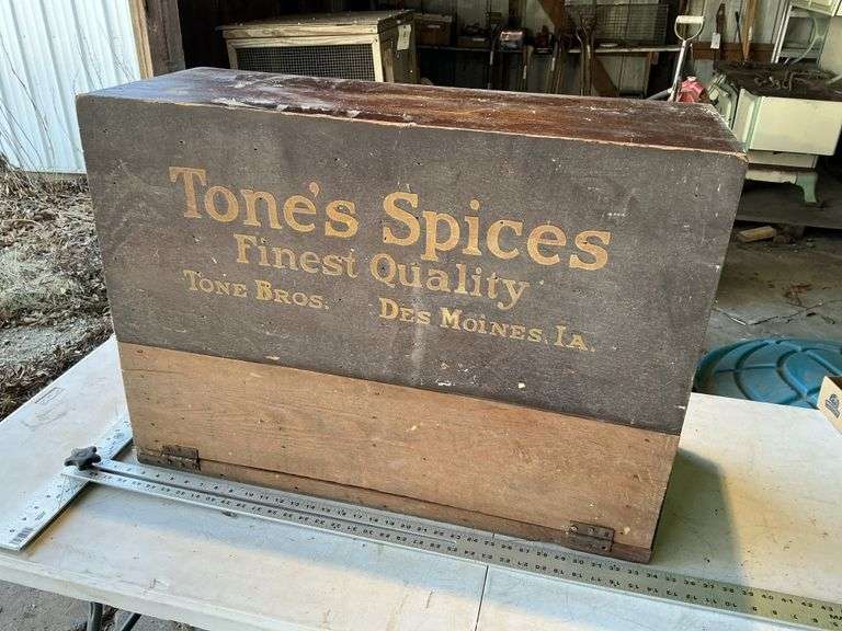 Tone’s Spices spice cabinet - Legacy Auction Company