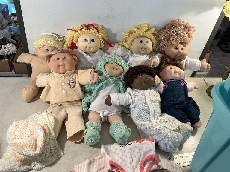 Cabbage Patch dolls, clothes with tote - Legacy Auction Company