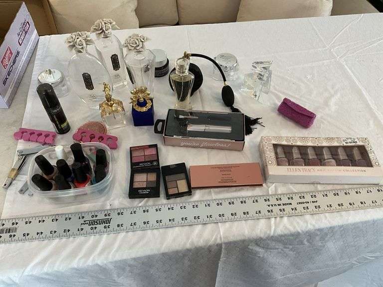 Assorted perfume bottles and make up, etc. - Legacy Auction Company