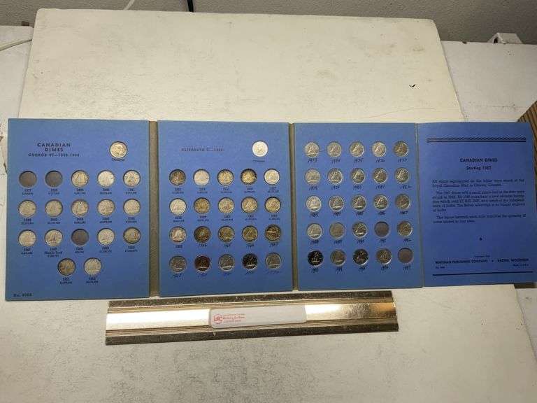 Canadian dime book with coins - Legacy Auction Company