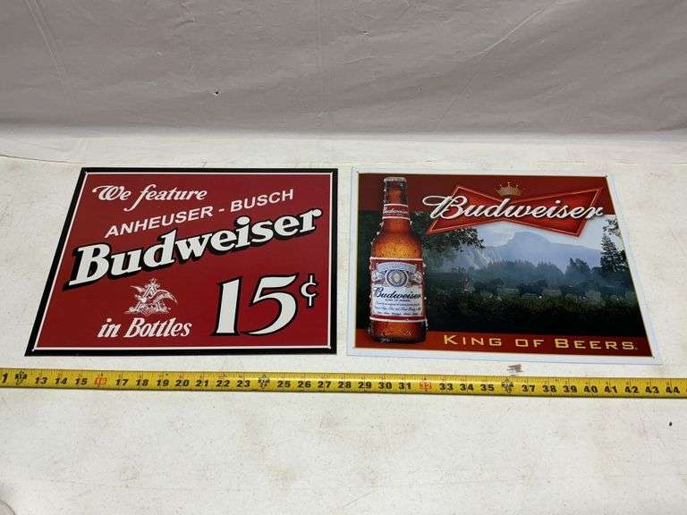 Metal Budweiser signs - Legacy Auction Company