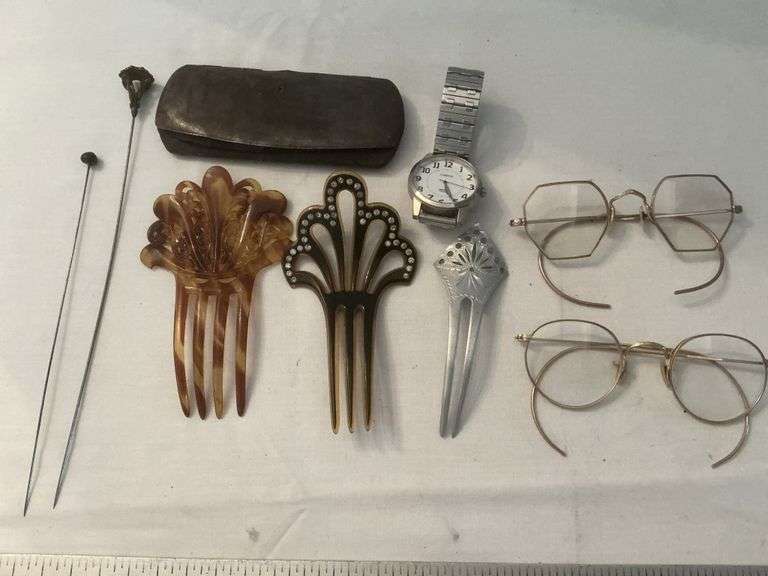 Hair combs, eye glasses, watch & hat pins - Legacy Auction Company