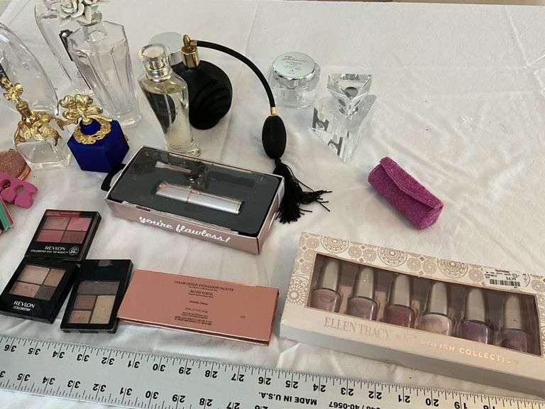 Assorted perfume bottles and make up, etc. - Legacy Auction Company