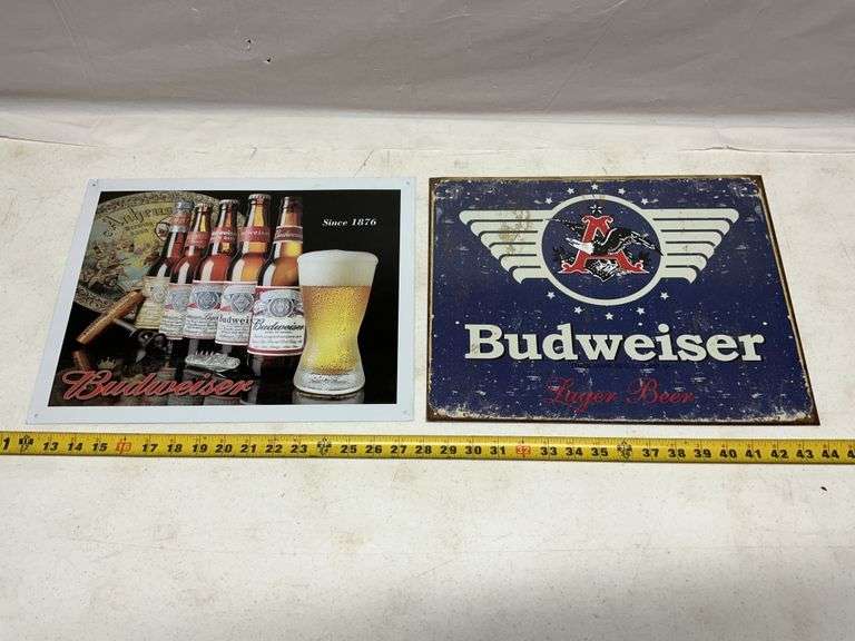 Metal Budweiser signs - Legacy Auction Company