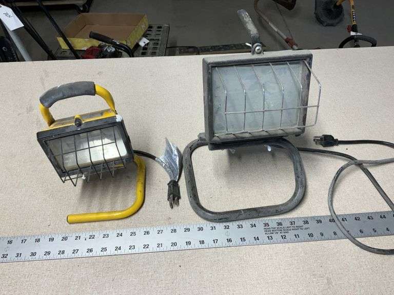 2- halogen work lights. Work. - Legacy Auction Company