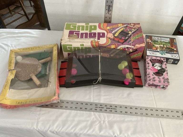 Gnip Gnop game, table tennis, Bunco and puzzle - Legacy Auction Company