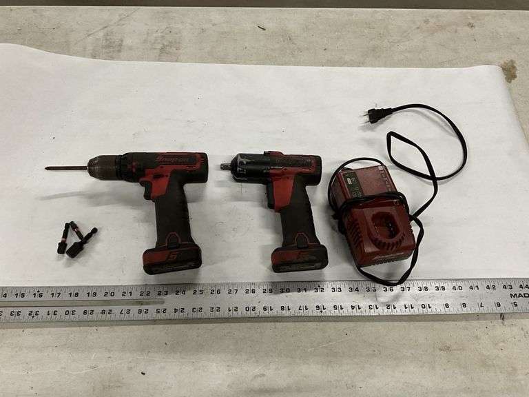 Snap-On drill/driver set with charger and - Legacy Auction Company