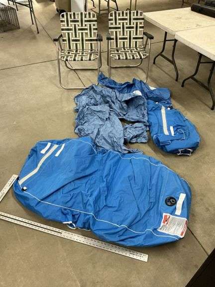 Pool cover floats and aluminum folding chairs - Legacy Auction Company