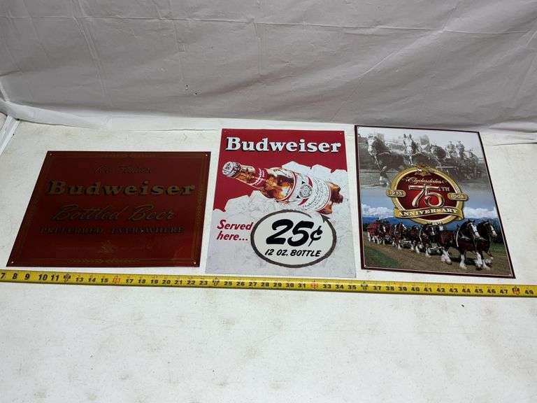 Metal Budweiser signs - Legacy Auction Company