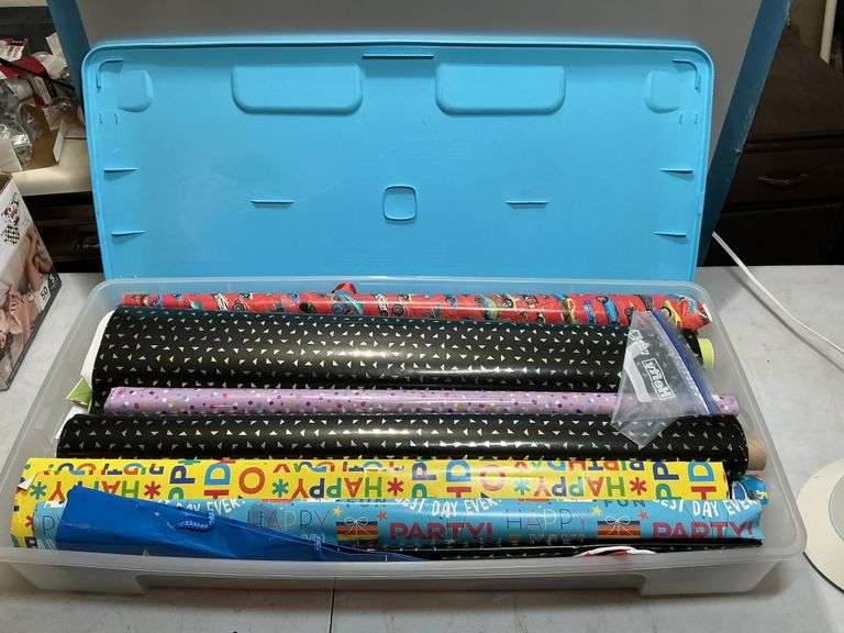 Tote of wrapping paper, gift bags - Legacy Auction Company