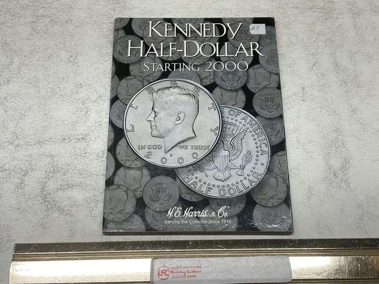 Kennedy half dollar album with extra 2009 D coin - Legacy Auction Company