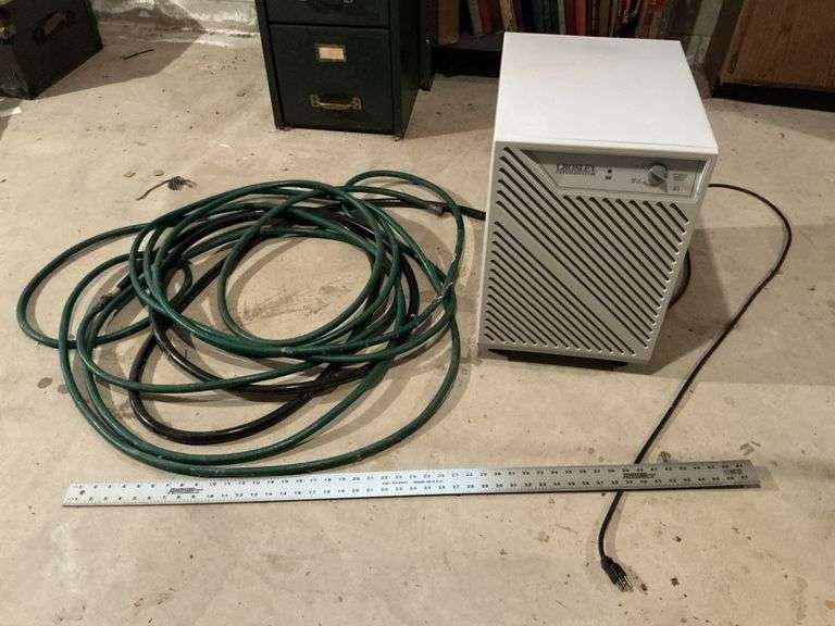 Crosley dehumidifier and hose - Legacy Auction Company