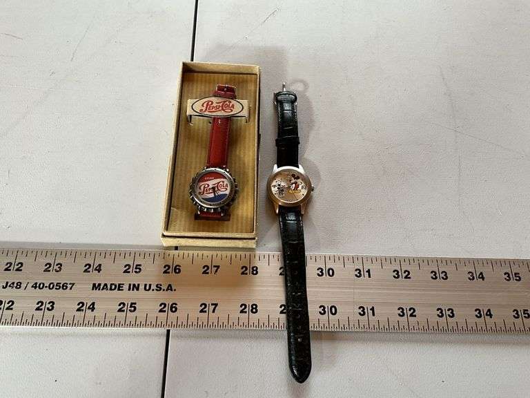 Pepsi and Mickey Mouse watches - Legacy Auction Company