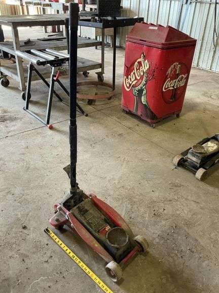 Big red 3 ton floor jack - Legacy Auction Company