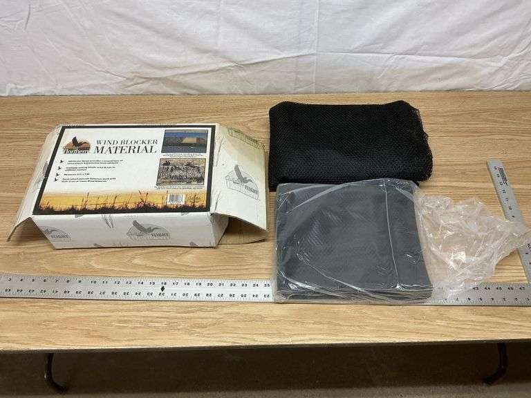 Cabela’s wind blocker material - Legacy Auction Company