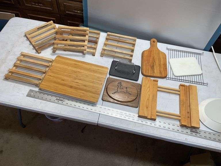 Cast press ,cutting boards and cooling racks - Legacy Auction Company