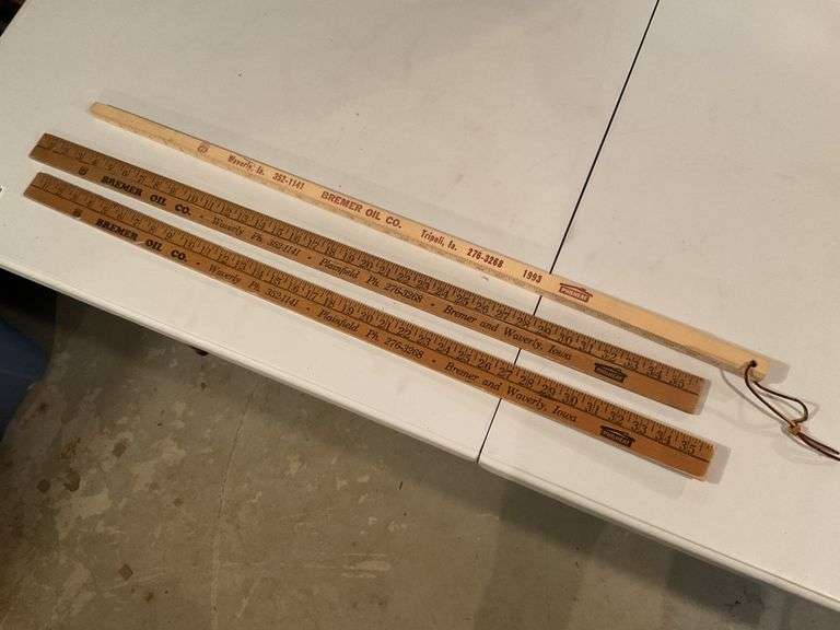 Bremer Oil Co. measuring sticks - Legacy Auction Company