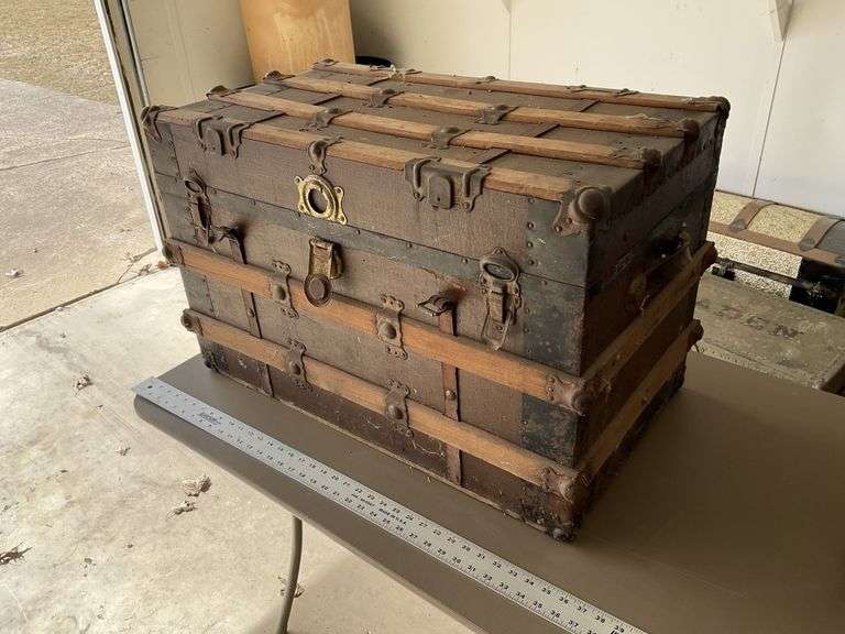 Antique flat top trunk - Legacy Auction Company