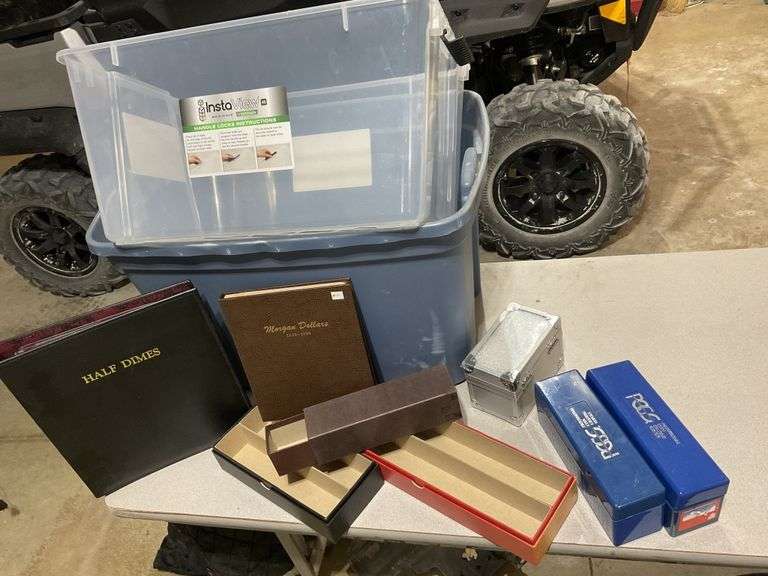 Empty coin binders, coin boxes and 2- totes with - Legacy Auction Company