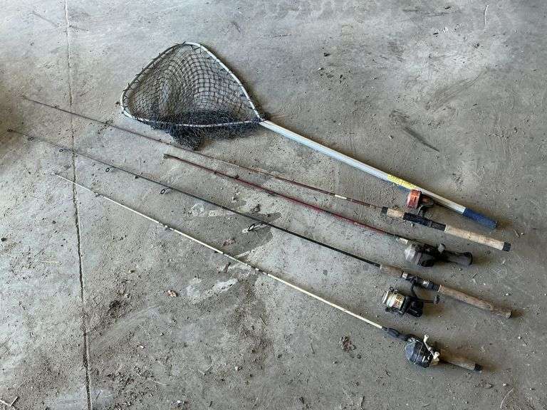 Fishing rods and net - Legacy Auction Company