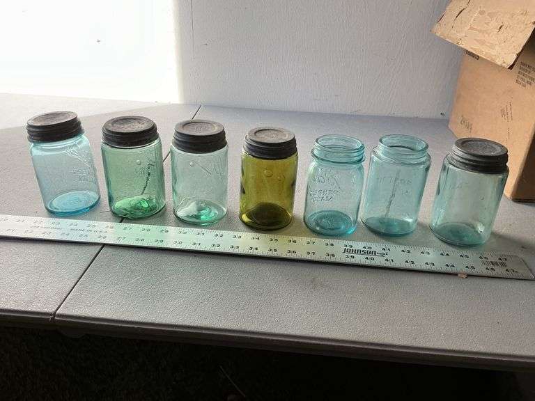 Pint ball jars, different colors. - Legacy Auction Company