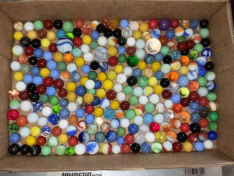 1- box of marbles - Legacy Auction Company