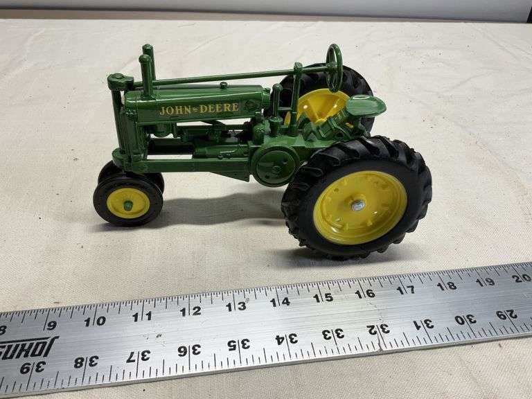 John Deere model A toy tractor - Legacy Auction Company