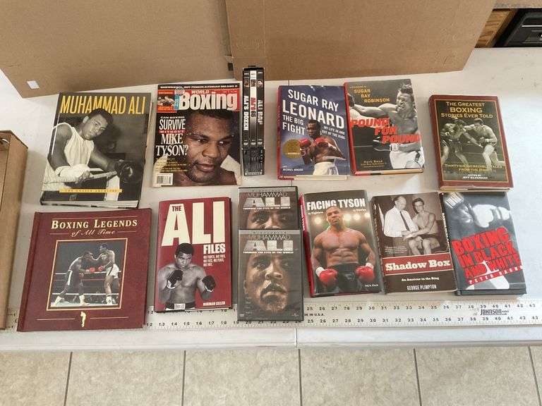 Muhammad Ali boxing books and DVDs etc. - Legacy Auction Company