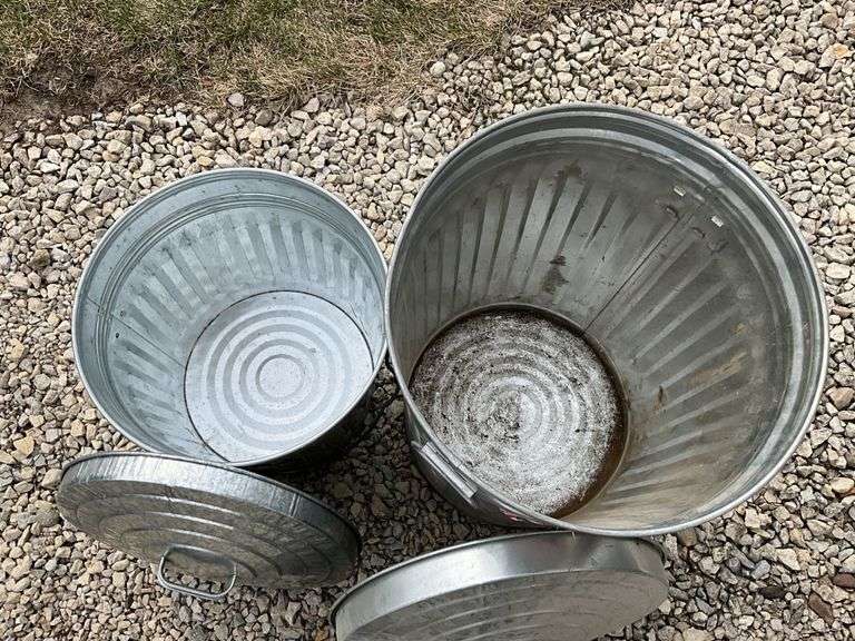 20 and 10 gallon galvanized garbage cans with - Legacy Auction Company