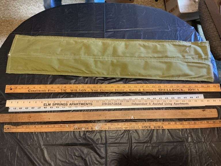 Yardsticks and cover - Legacy Auction Company