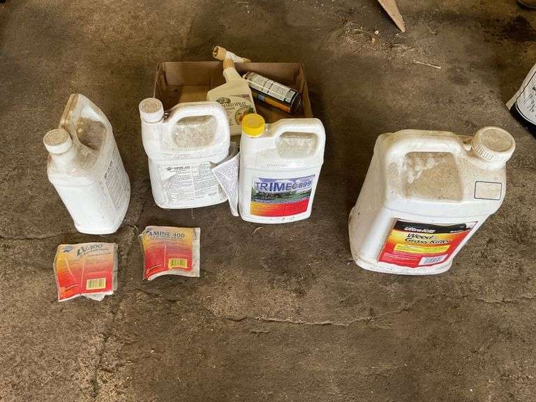 Assorted chemicals including 2,4-D, generic - Legacy Auction Company