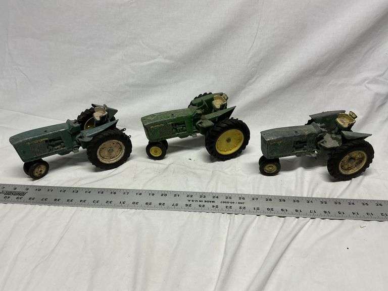 John Deere tractors, rough condition. - Legacy Auction Company