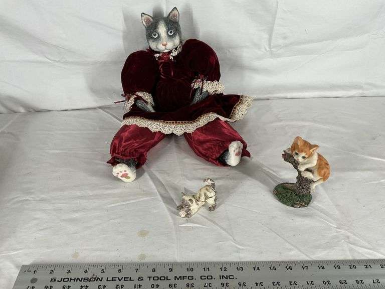 Porcelain cat doll and figurines - Legacy Auction Company