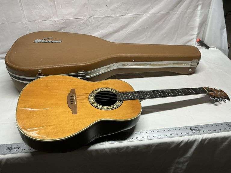 Ovation guitar with case - Legacy Auction Company
