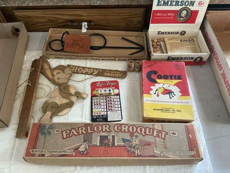 Alaska moose holder, cootie game, parlor croquet, - Legacy Auction Company