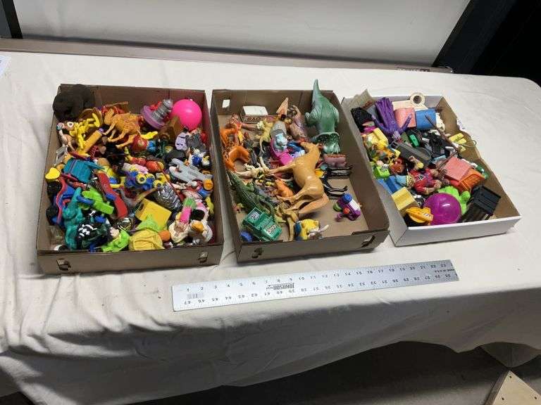 Assorted small toys - Legacy Auction Company