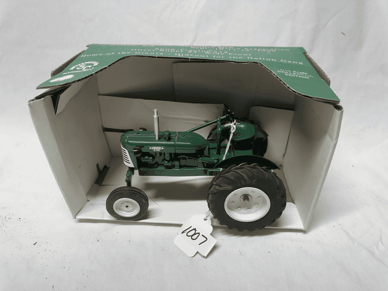 Oliver 440 toy tractor in a 550 box. - Legacy Auction Company