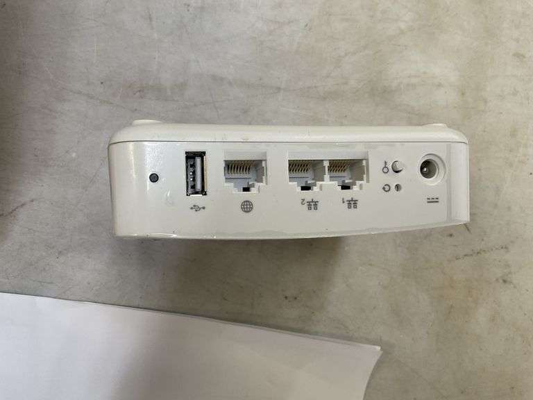 Giga Spire Blast wi-Fi booster - Legacy Auction Company