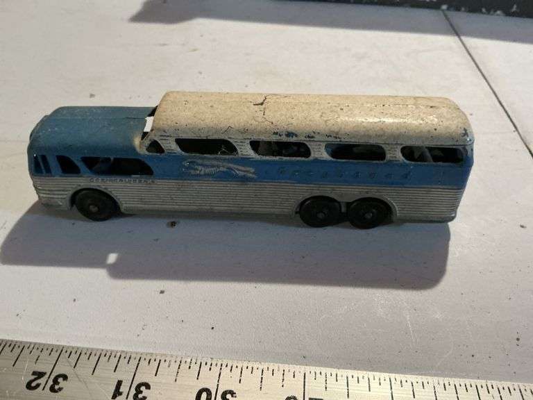 Vintage Greyhound bus - Legacy Auction Company