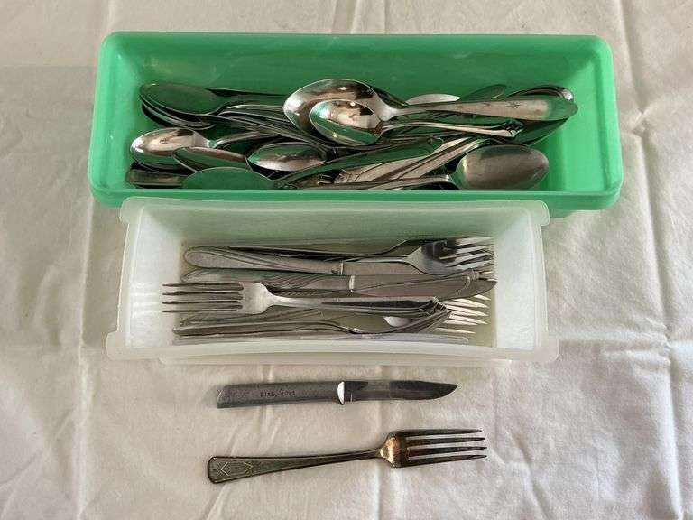 Misc silverware with Tupperware container - Legacy Auction Company