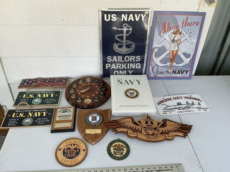 Navy signs, book, clock, etc - Legacy Auction Company